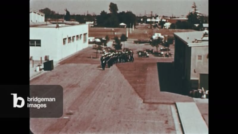 Image of United States, 1960s: A discipline police unit arrives at the