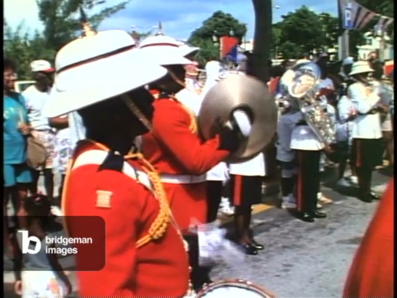 Bermuda Regimental Marching Band, red white uniforms, all black men