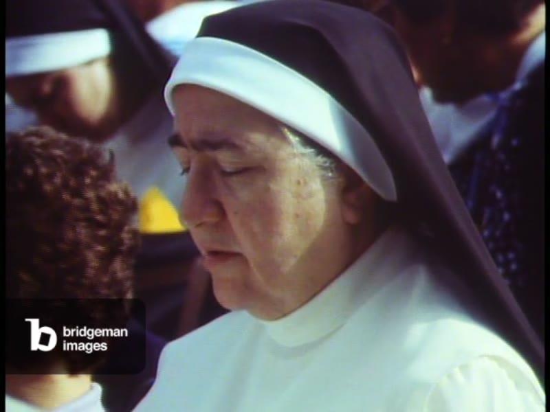 Image of Rome, Italy, The Vatican, Papal Mass, one nun, close up,