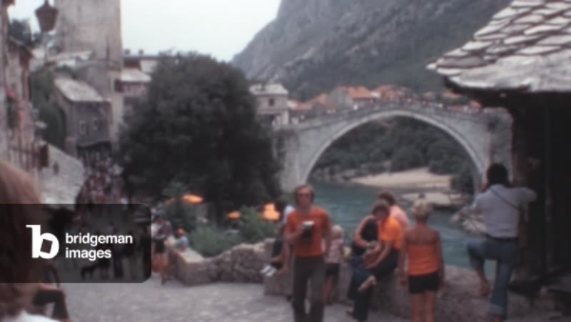 Image of Mostar Downtown in 1970s with Tourists in Narrow Streets. Stari