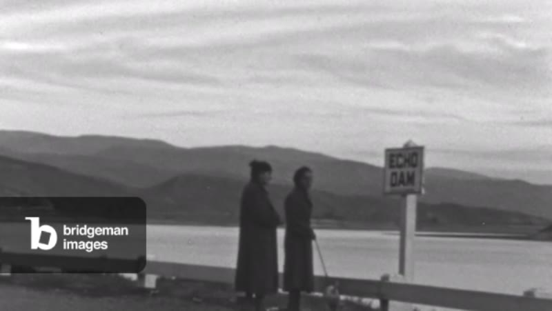 Image of Two Women with Dog Visit Echo Dam in the Late