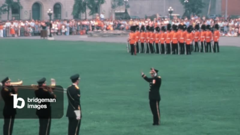 Image of Military orchestra conductor directing during ceremony in ...